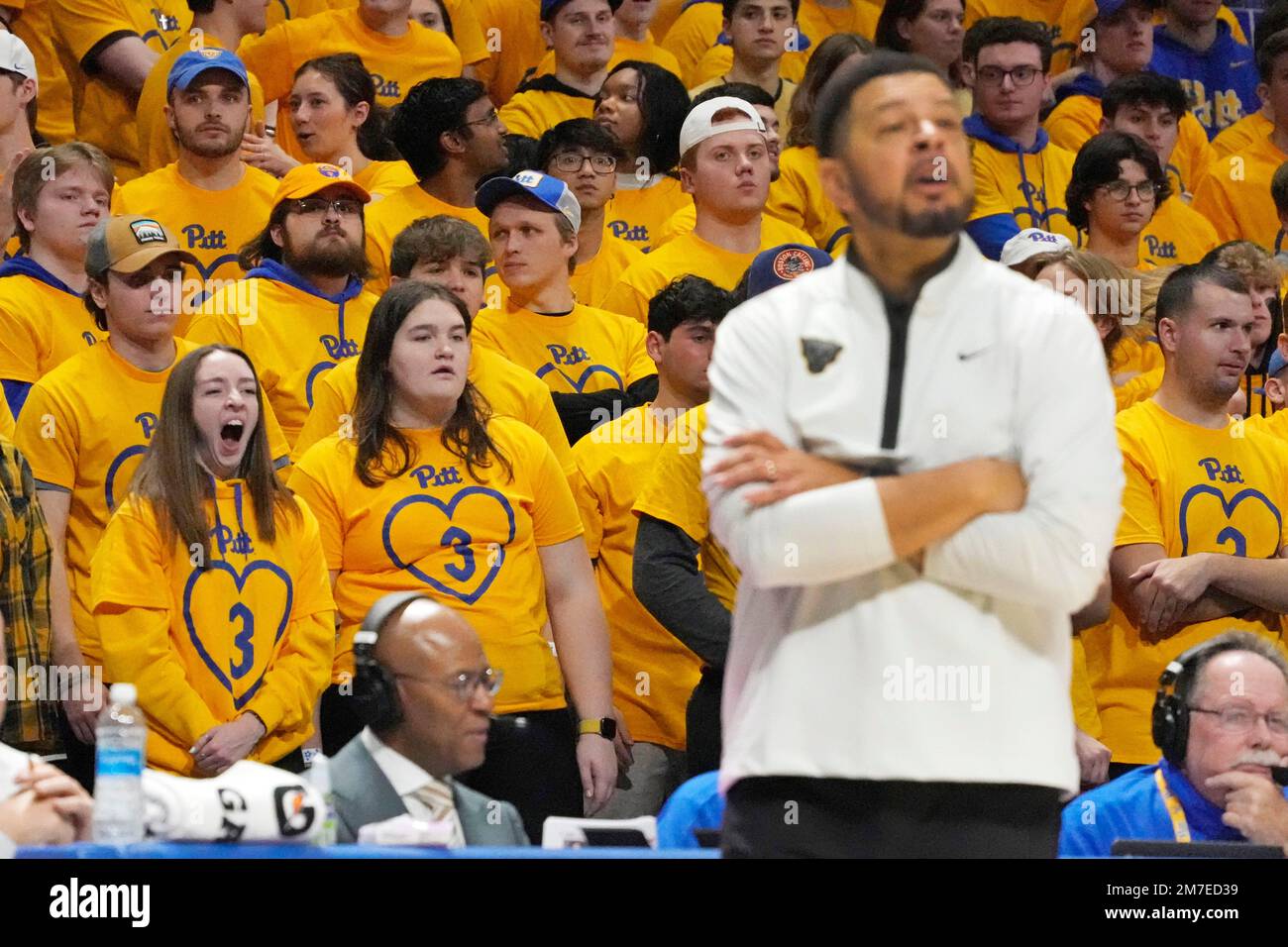 Pittsburgh head coach Jeff Capel, right, stands in front of the Pitt ...