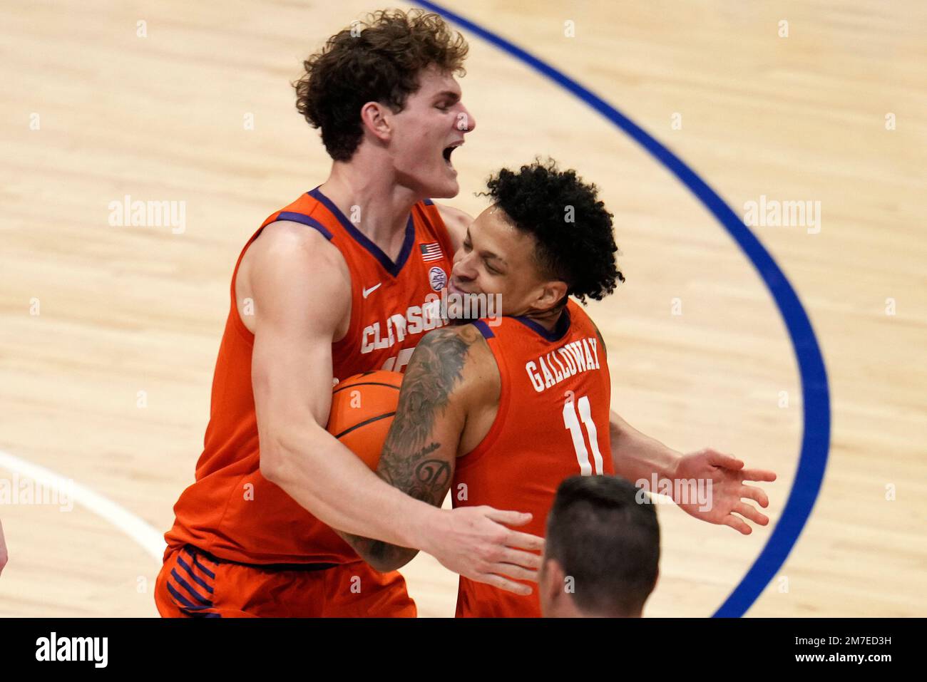 Clemson guard Brevin Galloway (11) celebrates with forward Ben ...