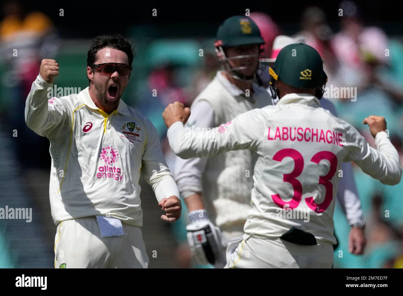 Australia's Travis Head, left, celebrates taking the wicket of South ...