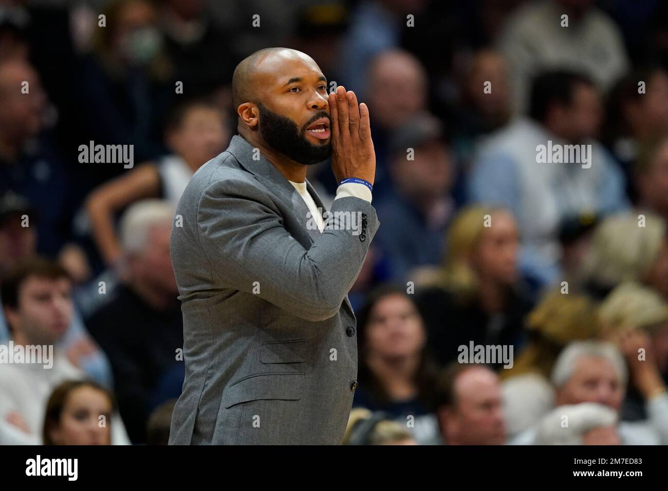 Villanova' Kyle Neptune coaches during an NCAA college basketball game ...
