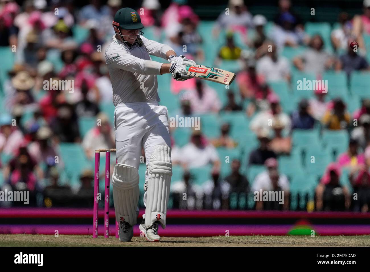 South Africa's Simon Harmer hits a delivery from Australia's Josh ...