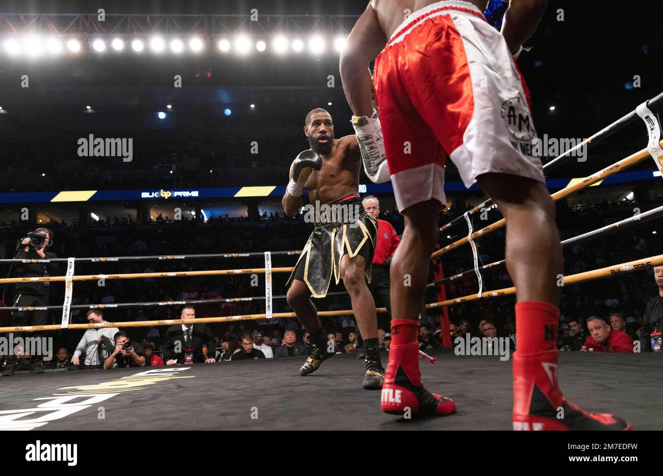 Steven Nelson, left, fights James Ballard during a light heavyweight ...