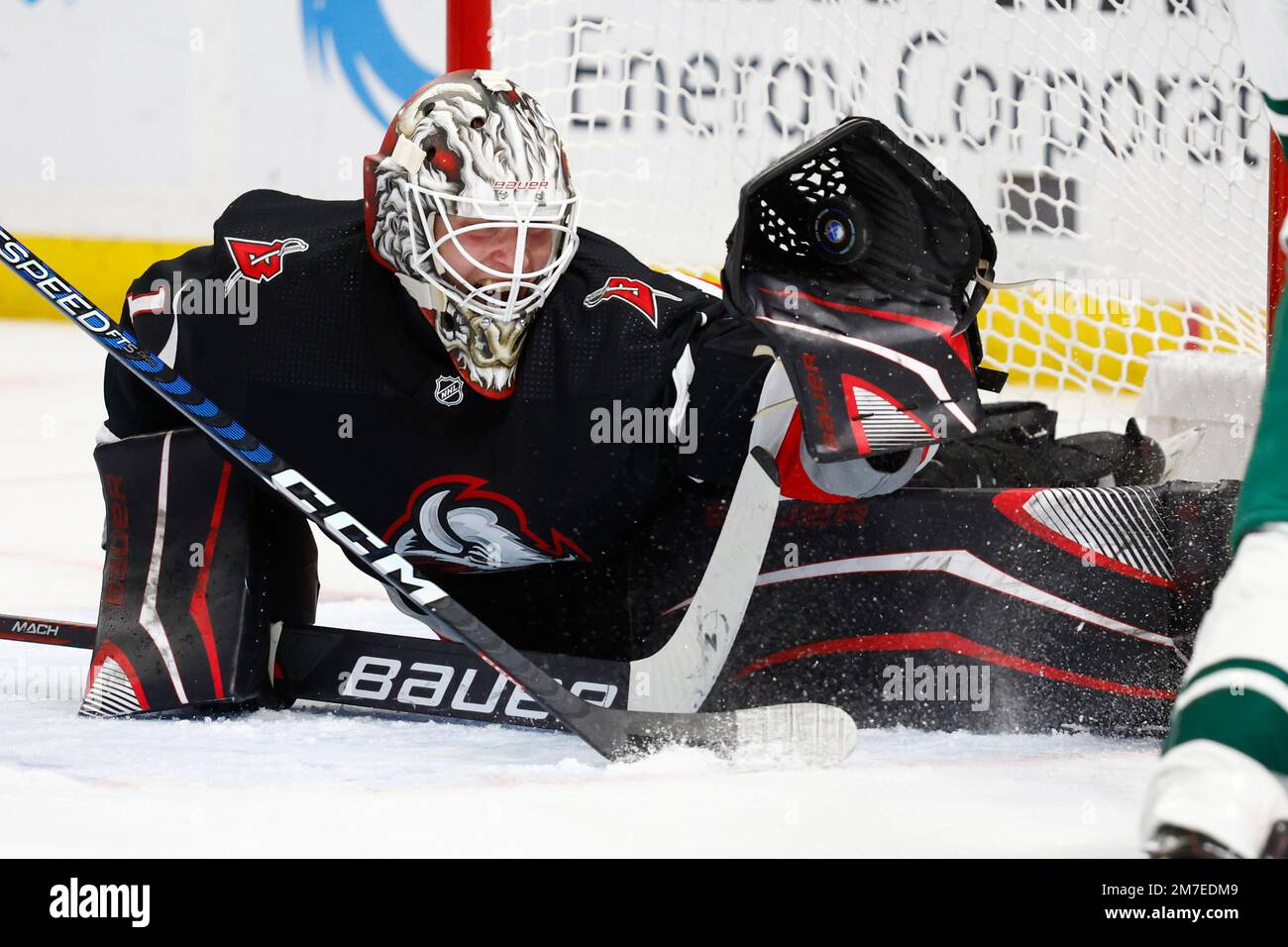 Buffalo Sabres goaltender Ukko-Pekka Luukkonen makes a glove save ...
