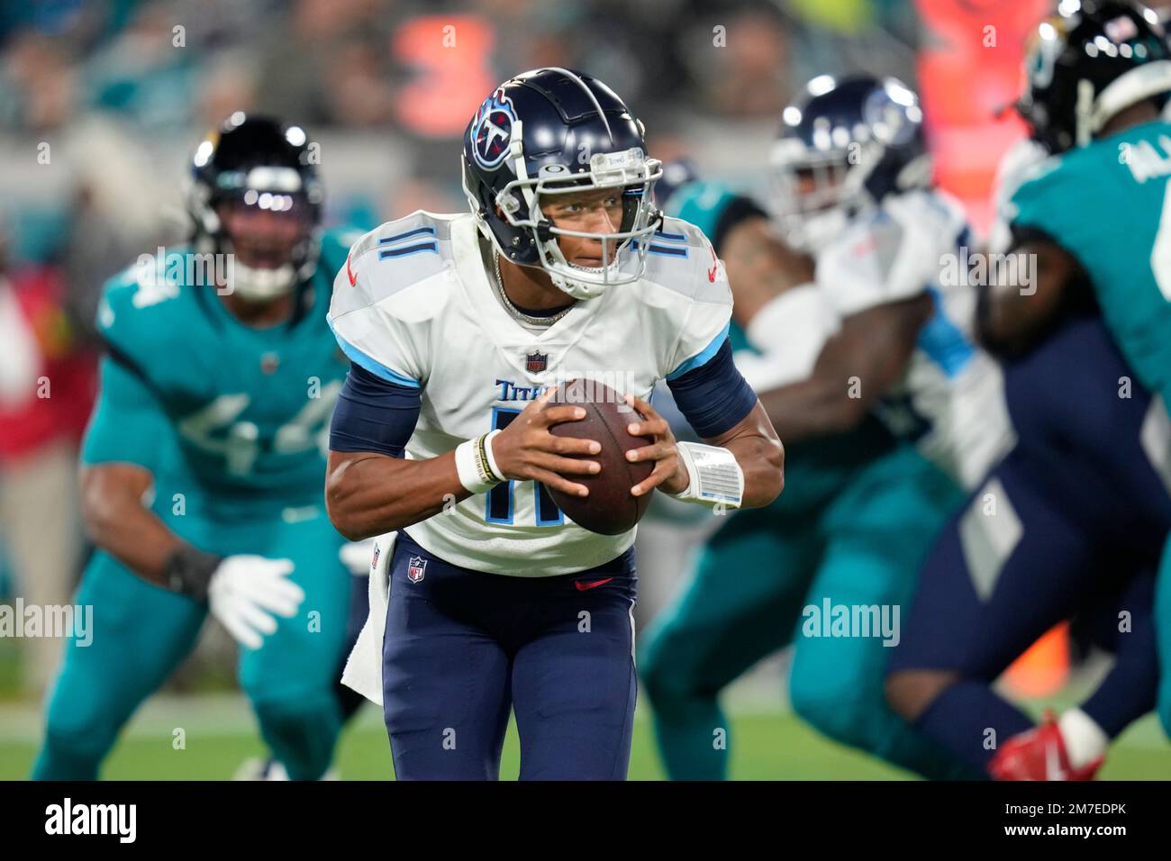 Tennessee Titans quarterback Joshua Dobbs (11) scrambles in the first ...