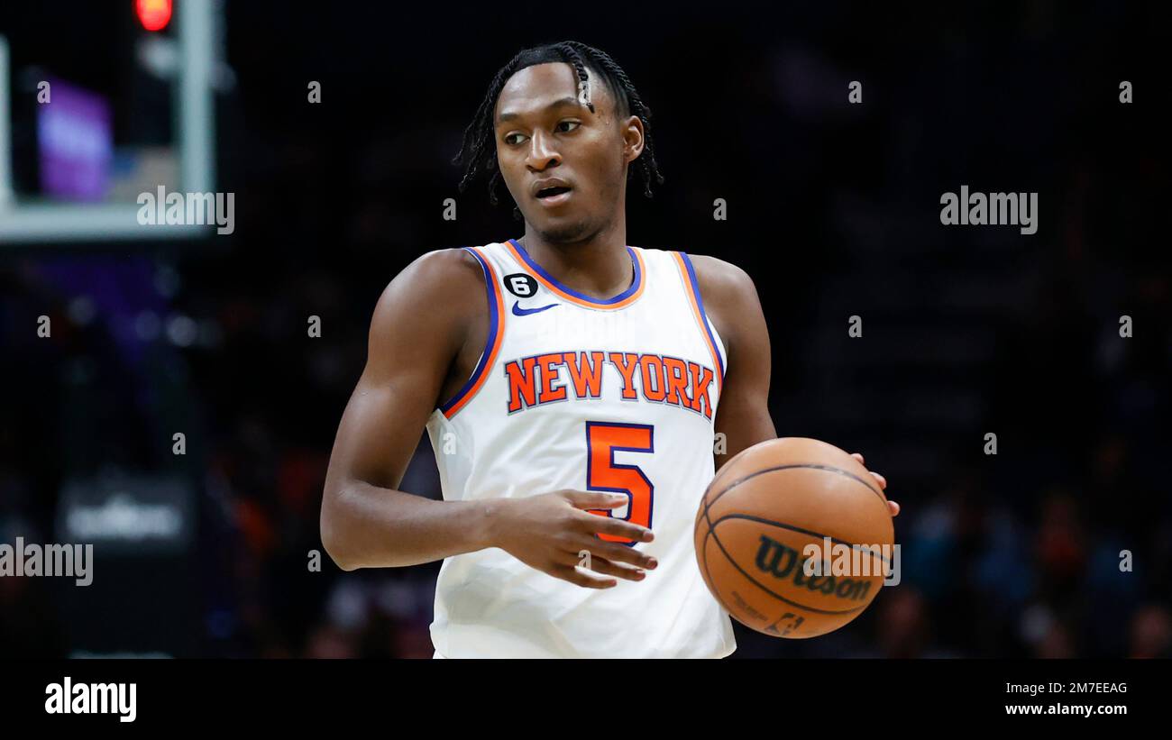 New York Knicks guard Immanuel Quickley brings the ball up court during ...