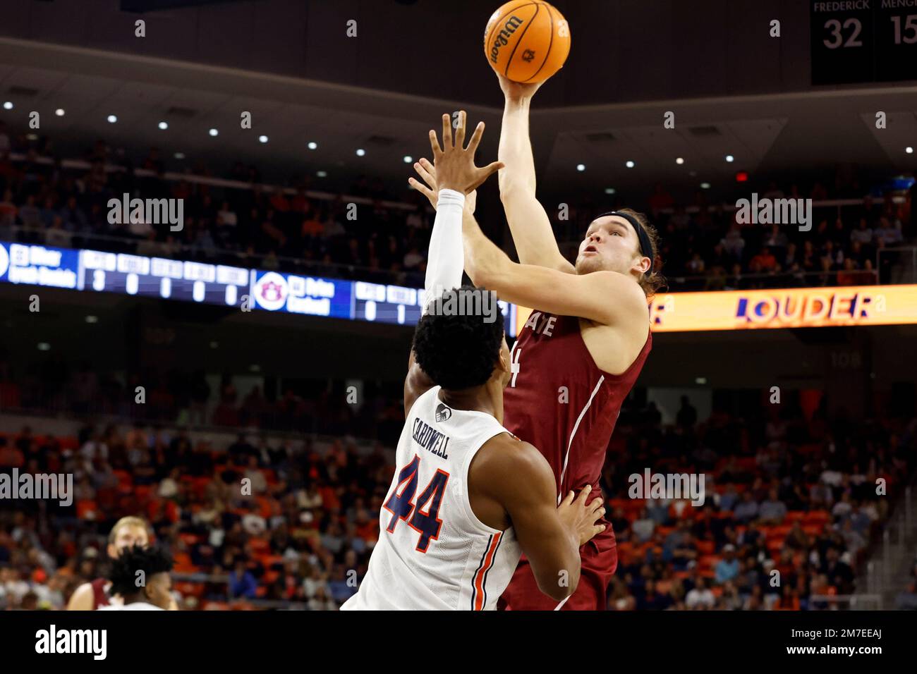 Colgate guard Alex Capitano (34) shoots over Auburn center Dylan ...