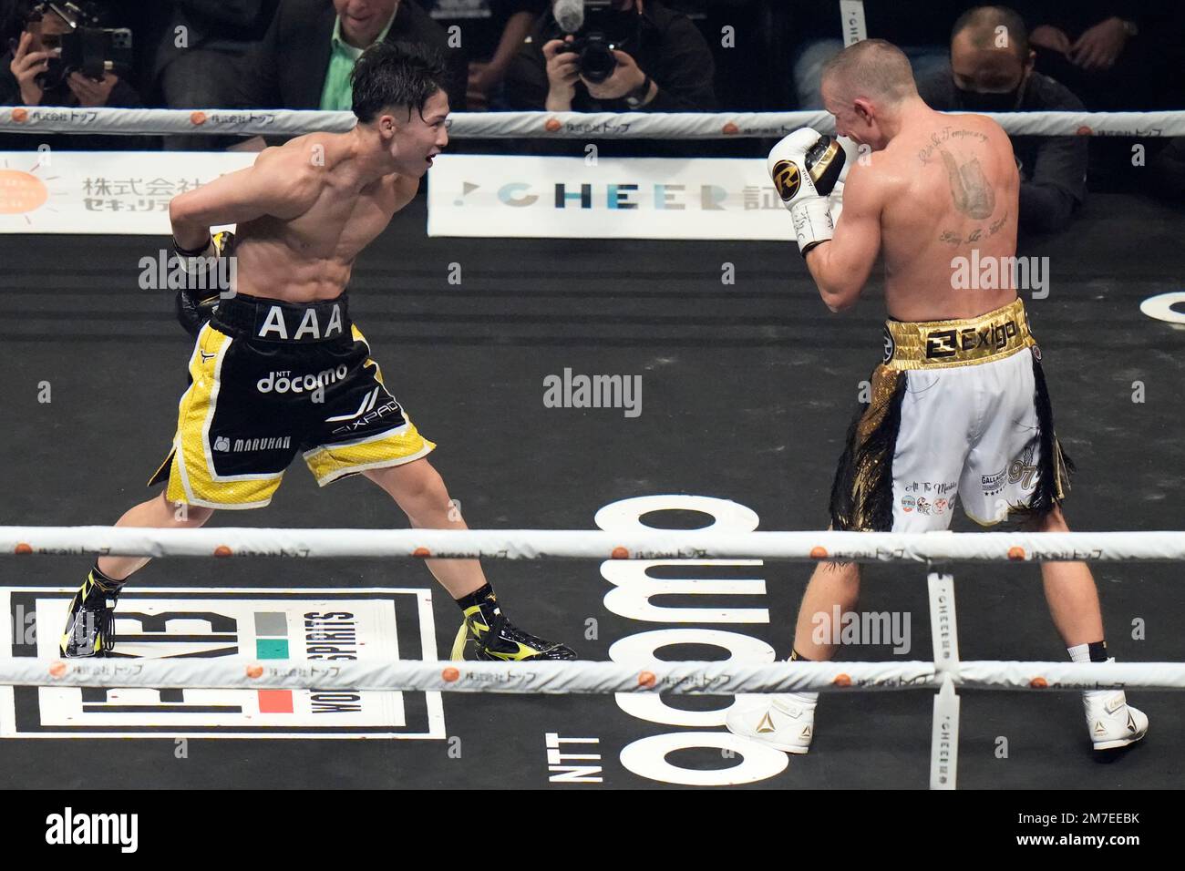 Naoya Inoue, left, of Japan and Paul Butler of Britain fight during ...