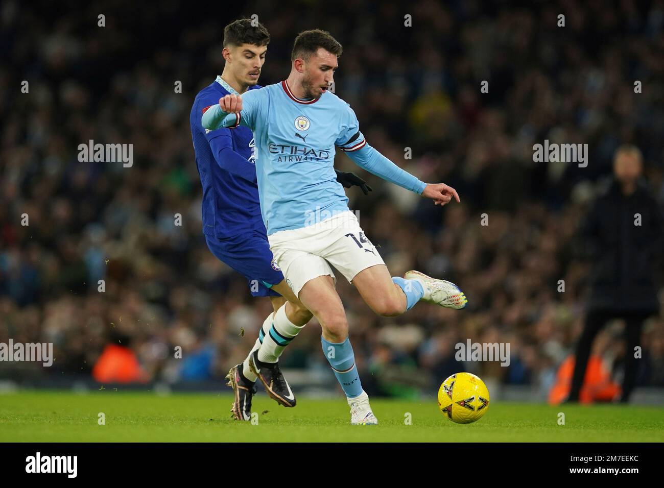Manchester City's Aymeric Laporte, front, is challenged by Chelsea's ...