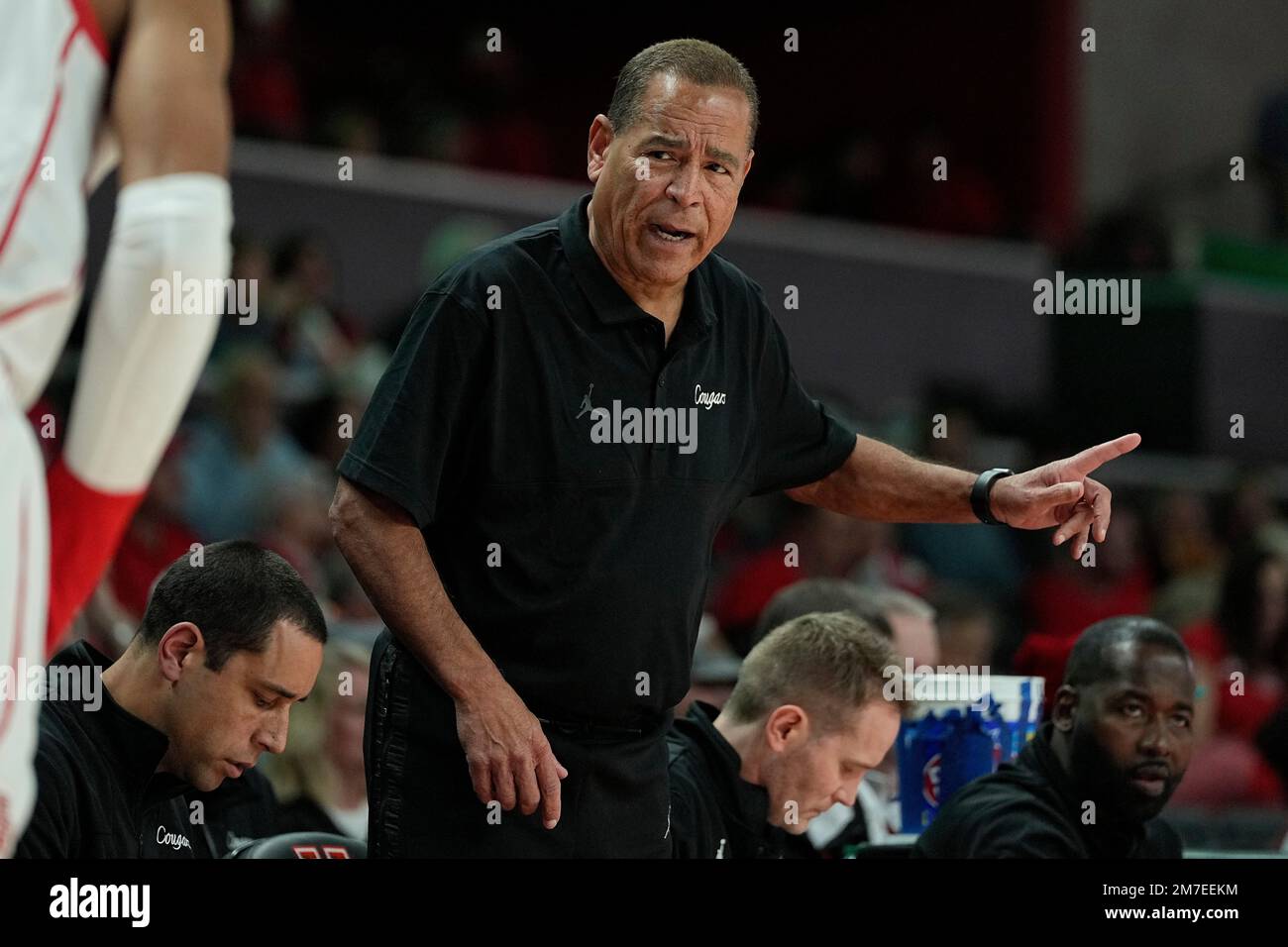 Houston head coach Kelvin Sampson instructs his team during the first ...
