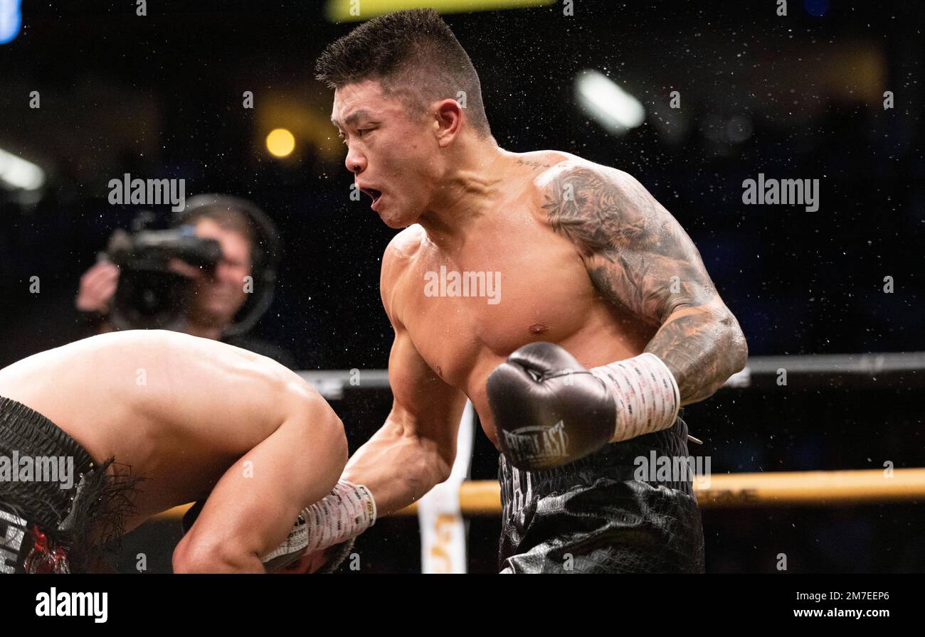 Arnold Khegai, right, fights Eduardo Baez during a featherweight boxing ... Arnold Khegai, right, fights Eduardo Baez during a featherweight boxing ...