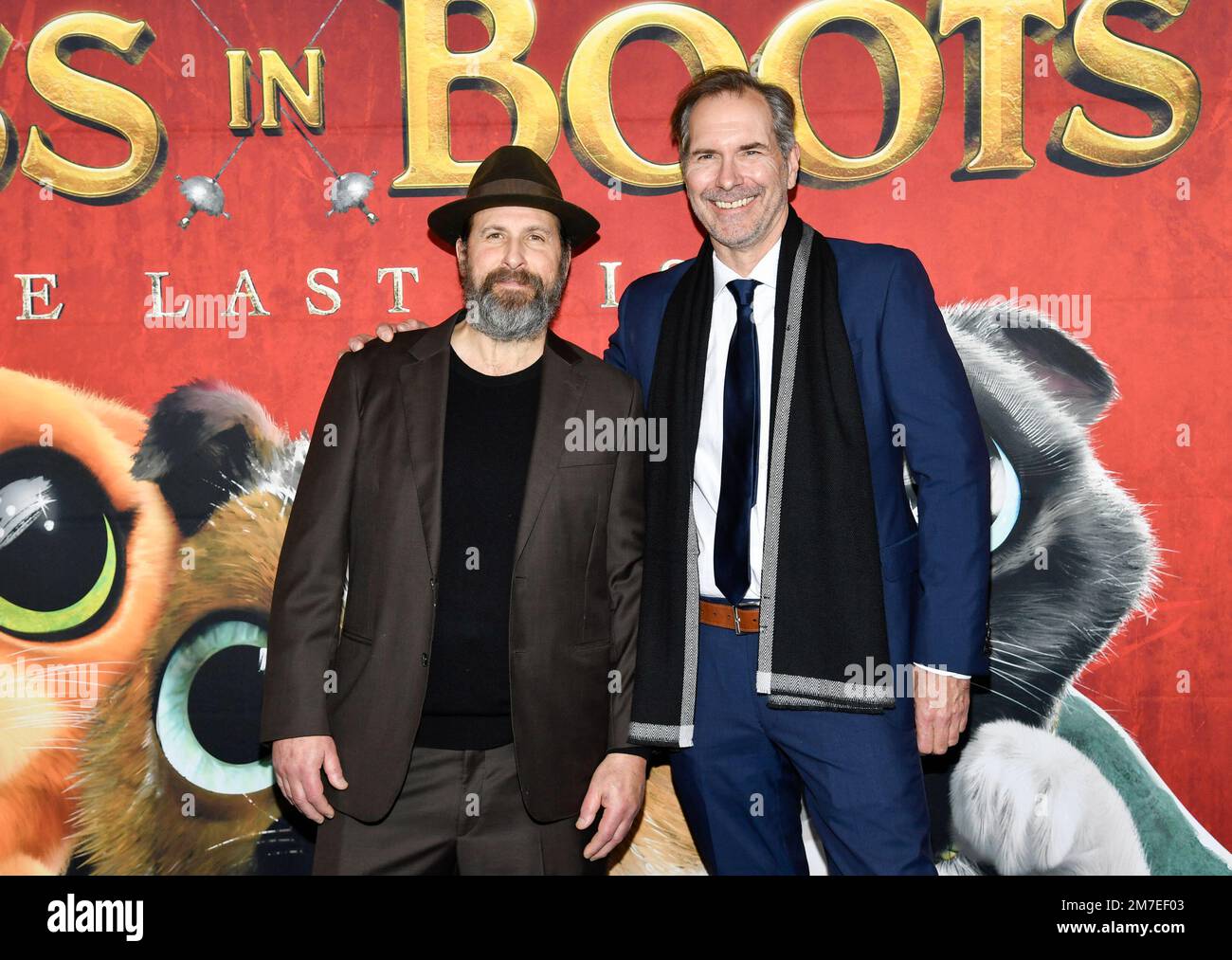 Screenwriters Tommy Swerdlow, left, and Paul Fisher attend the premiere of "Puss in Boots: The ...