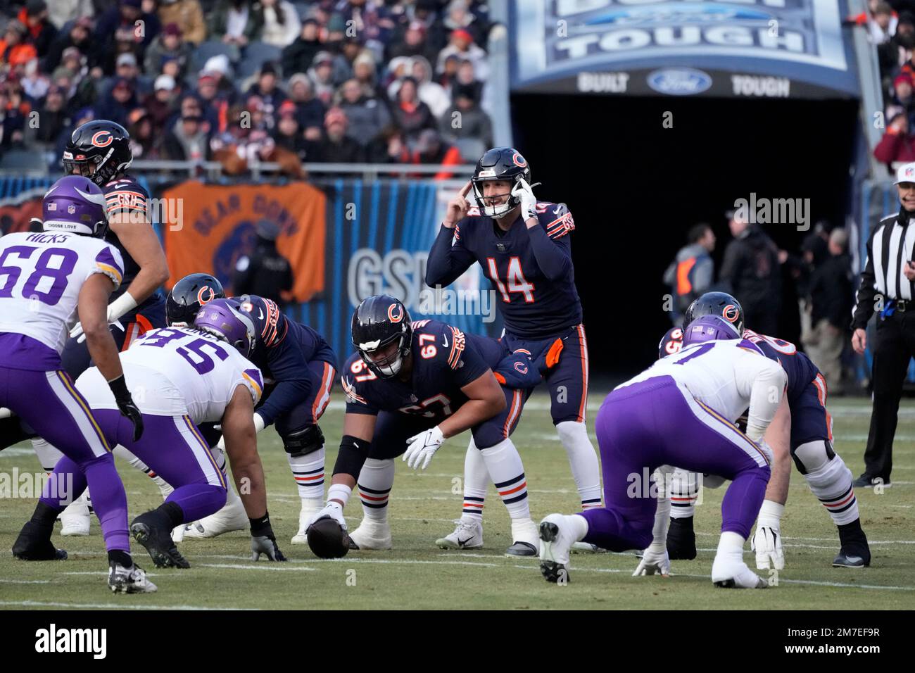 Chicago Bears quarterback Nathan Peterman (14) signals teammates during ...