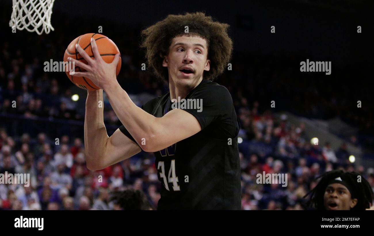 Washington center Braxton Meah grabs a rebound during the second half ...