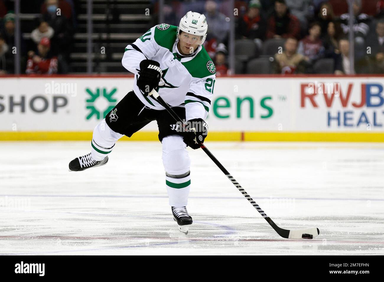 Dallas Stars defenseman Ryan Suter (20) passes against the New Jersey ...