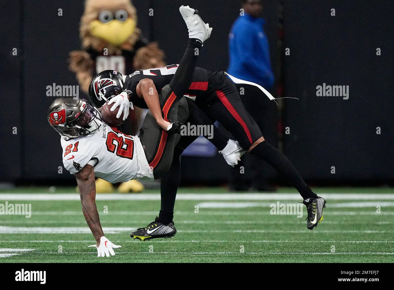 Tampa Bay Buccaneers running back Ke'Shawn Vaughn (21) is dropped by ...