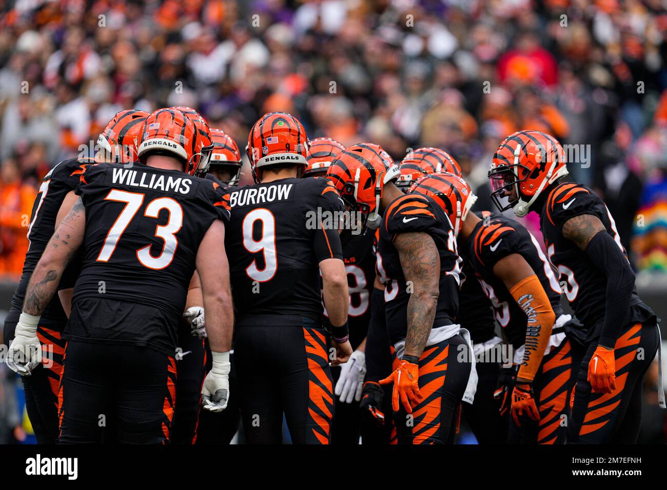 The Cincinnati Bengals huddle in the first half of an NFL football game ...