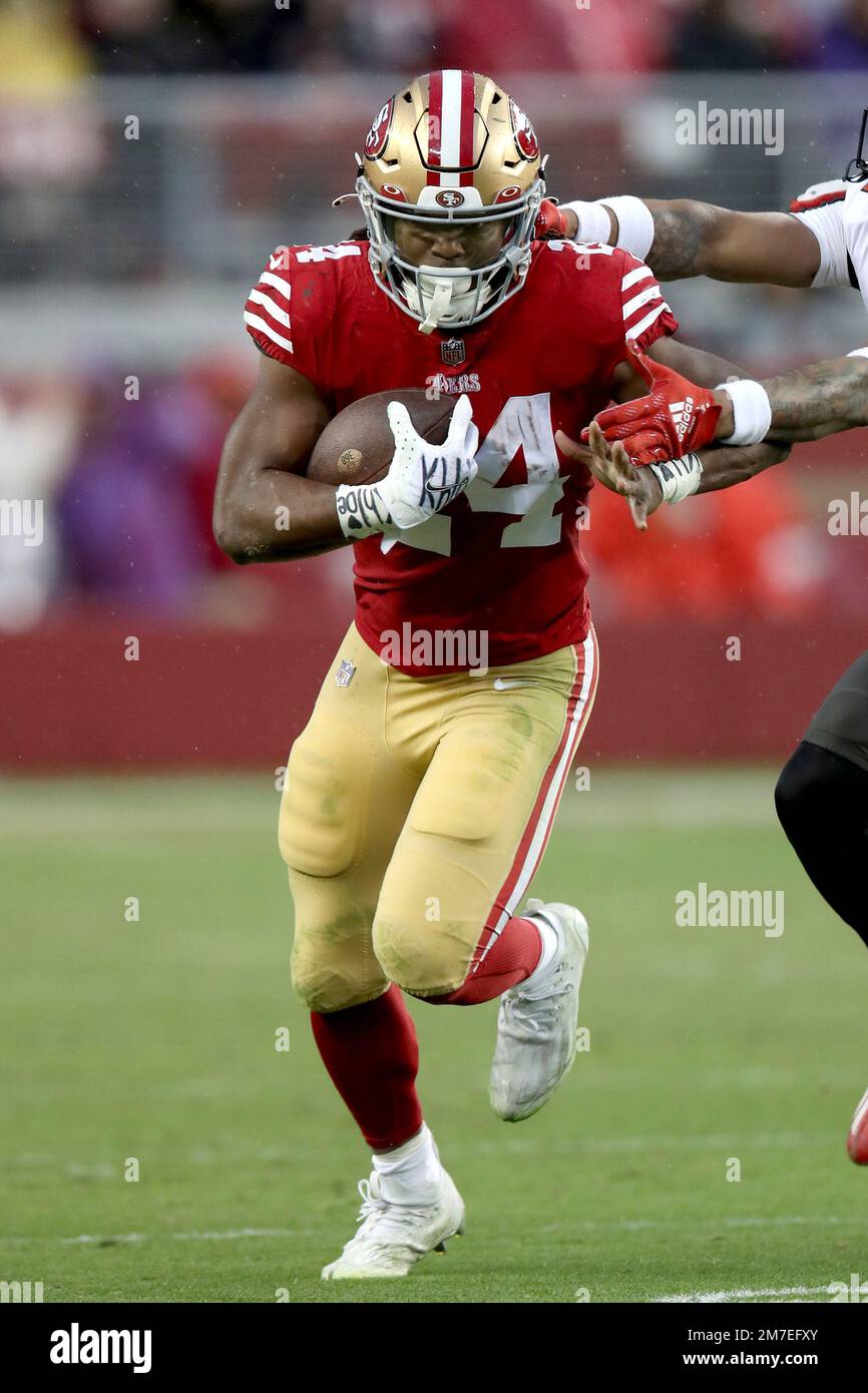 San Francisco 49ers running back Jordan Mason (24) runs during an NFL ...