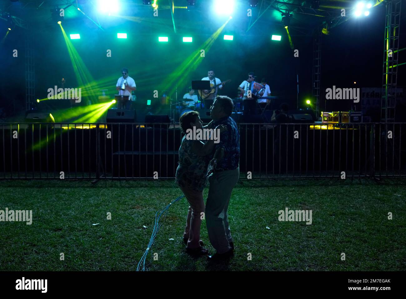 A couple dances during celebrations in honor of Saint Balthazar, one of ...