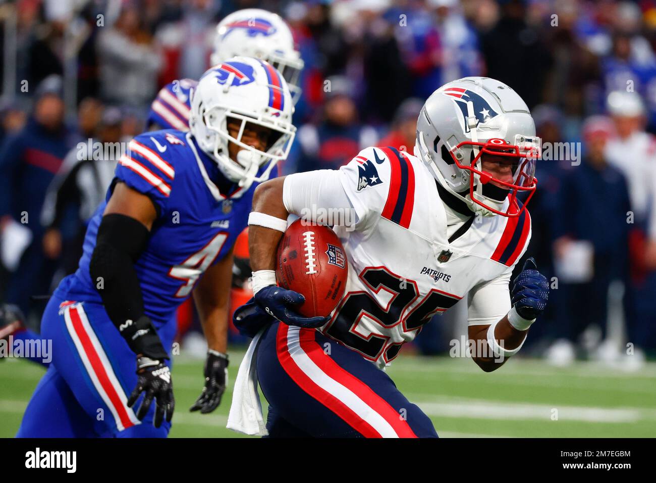New England Patriots cornerback Marcus Jones (25) runs the ball during the second half of an NFL ...