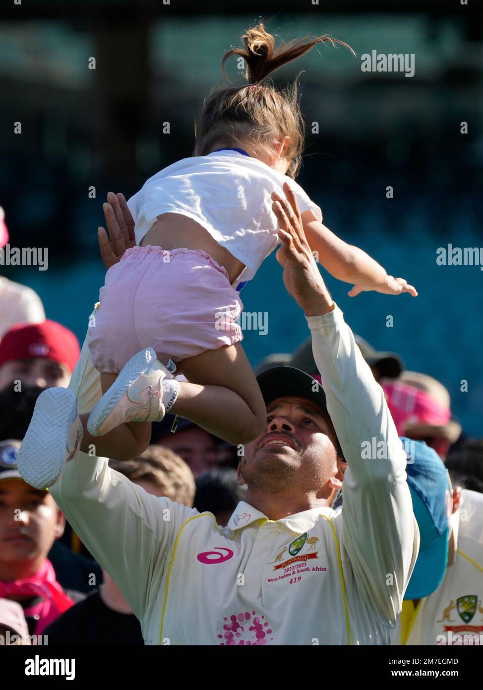 Man of the match Australia's Usman Khawaja plays with his daughter ...