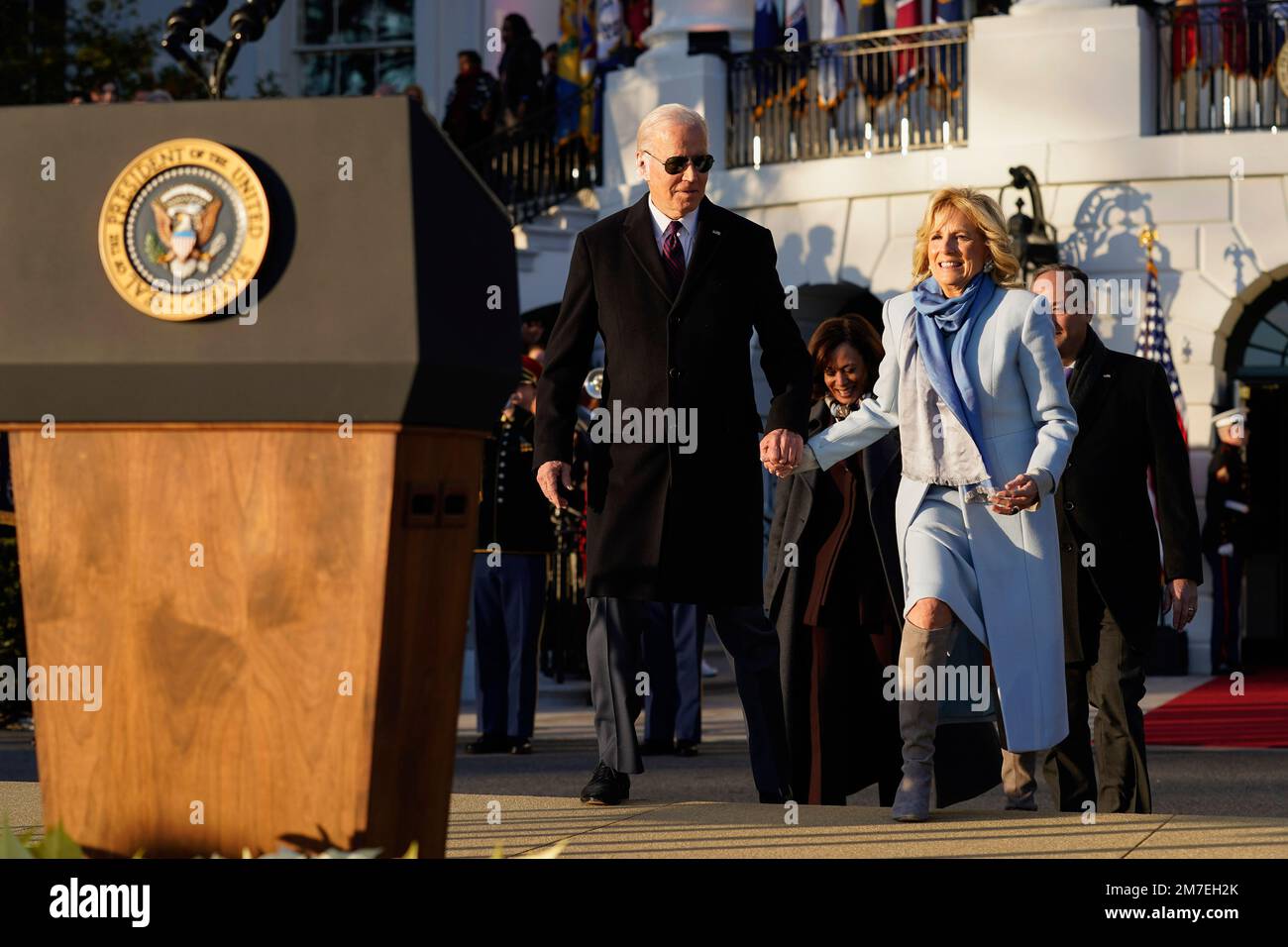 President Joe Biden and first lady Jill Biden arrive for a a bill ...