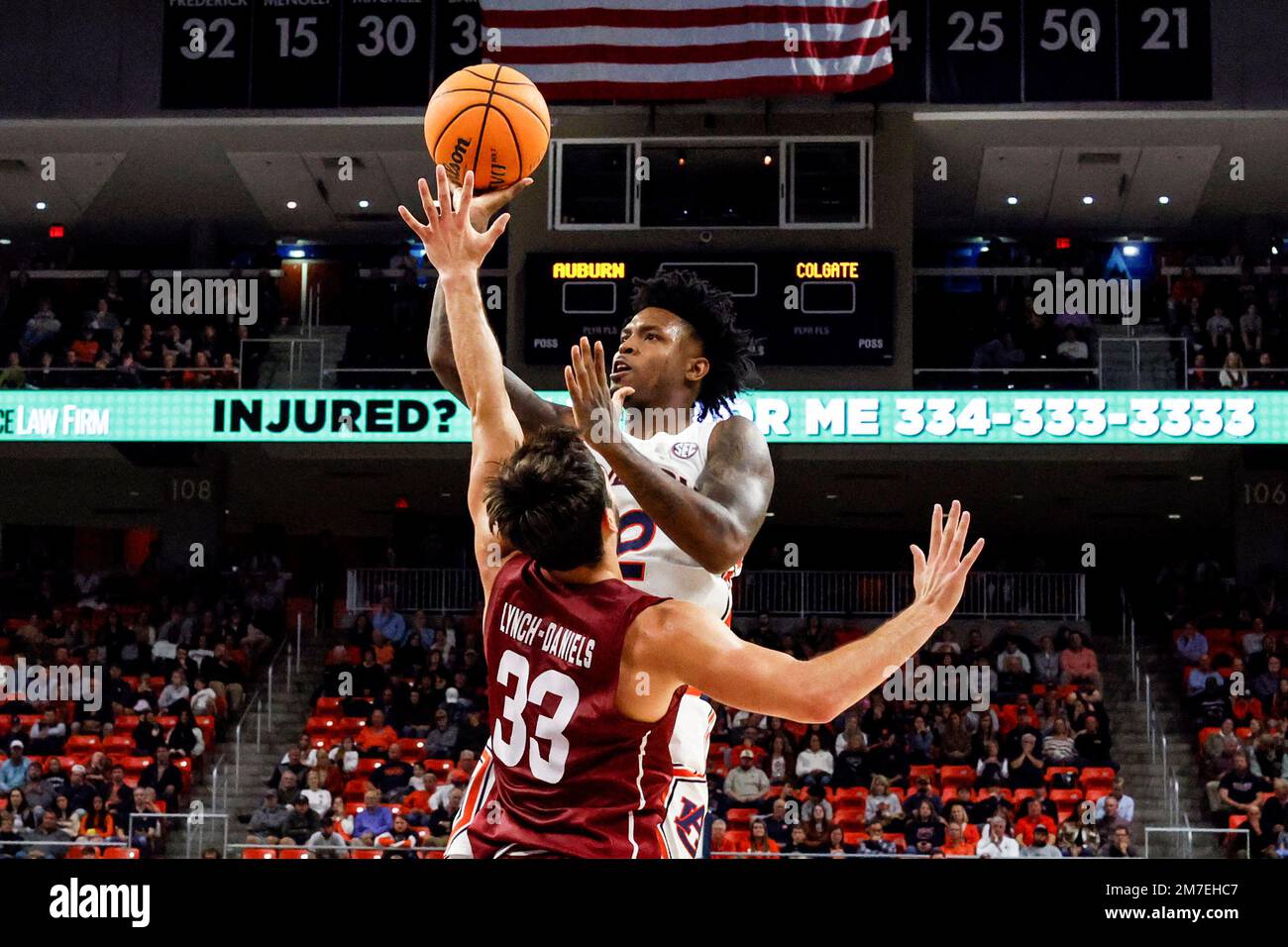 Auburn guard Zep Jasper (12) shoots over Colgate guard Oliver Lynch ...
