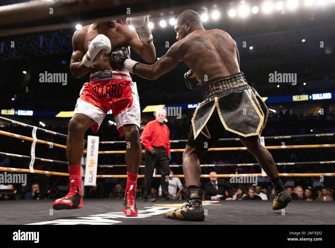 Steven Nelson, right, fights James Ballard during a light heavyweight ...