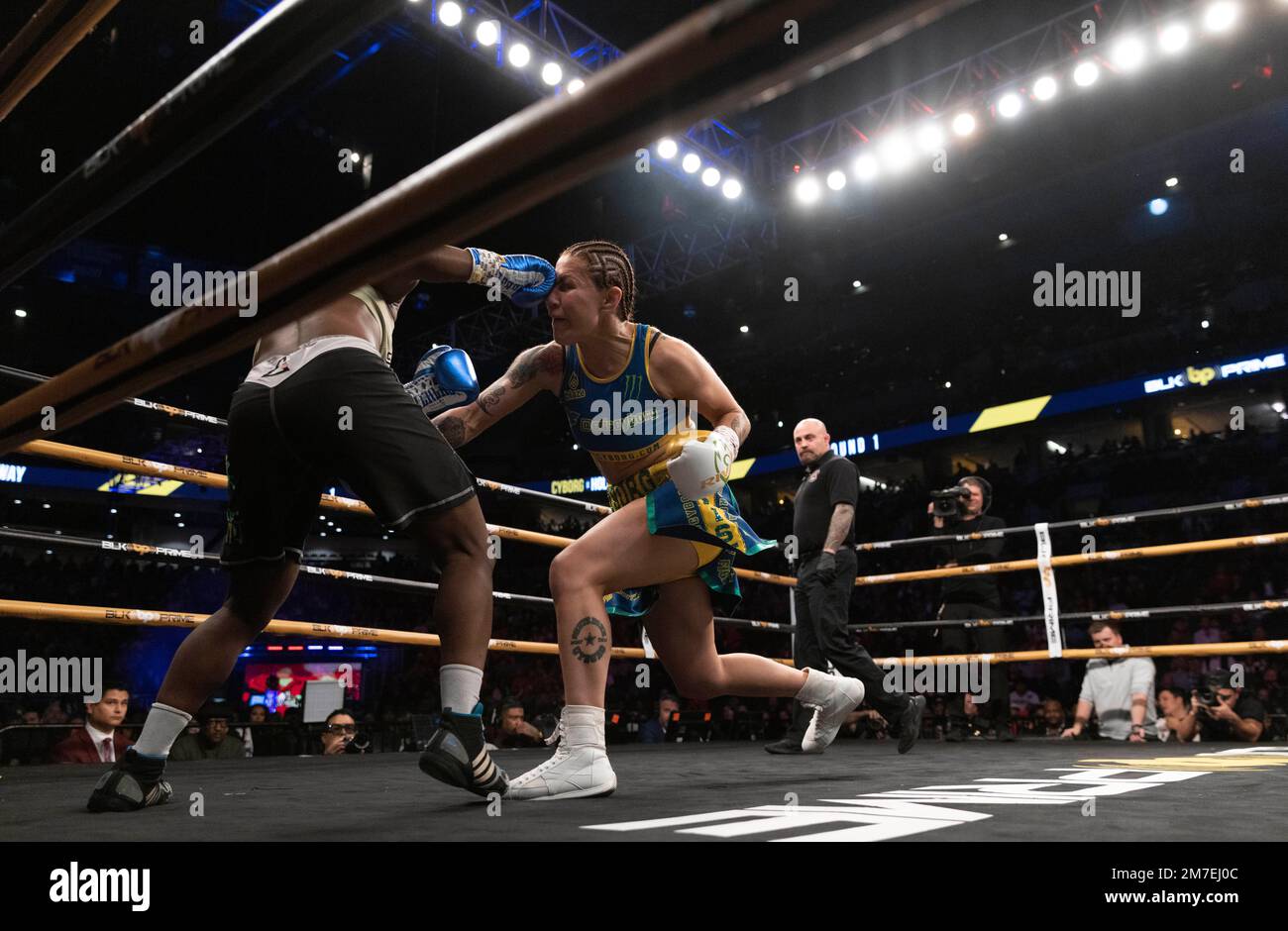 Cris Cyborg, right, fights Gabrielle Holloway during a boxing match on ...