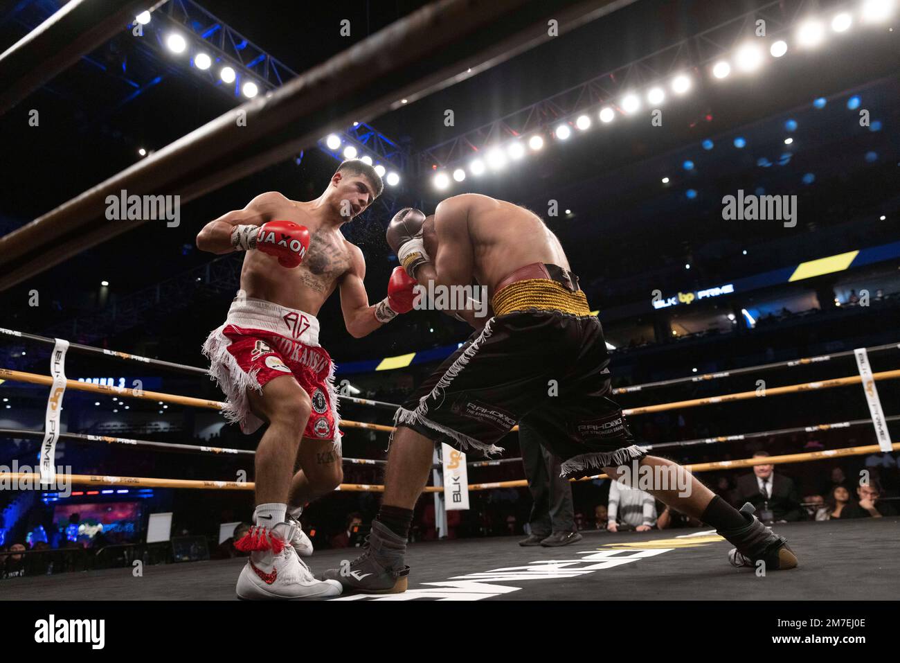 Alan Garcia, left, fights Eduardo Pereira during a lightweight boxing ...