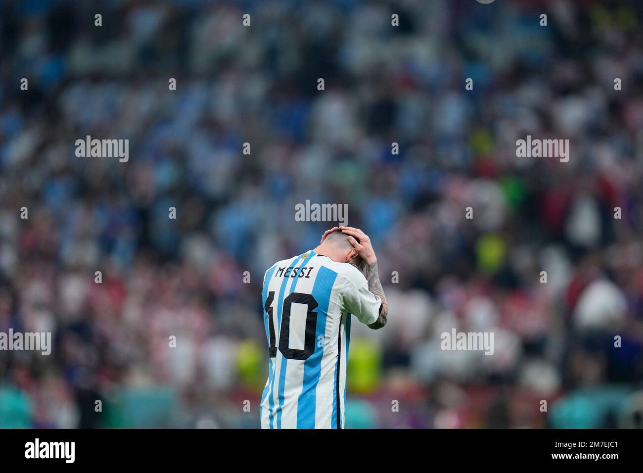 Argentina's Lionel Messi holds his head after beating Croatia 3-0 in a ...