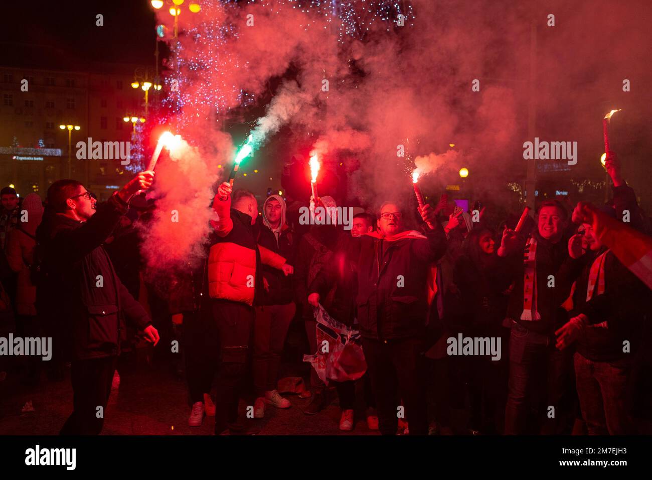 Croatian fans light flares after their team lost to Argentina at the ...