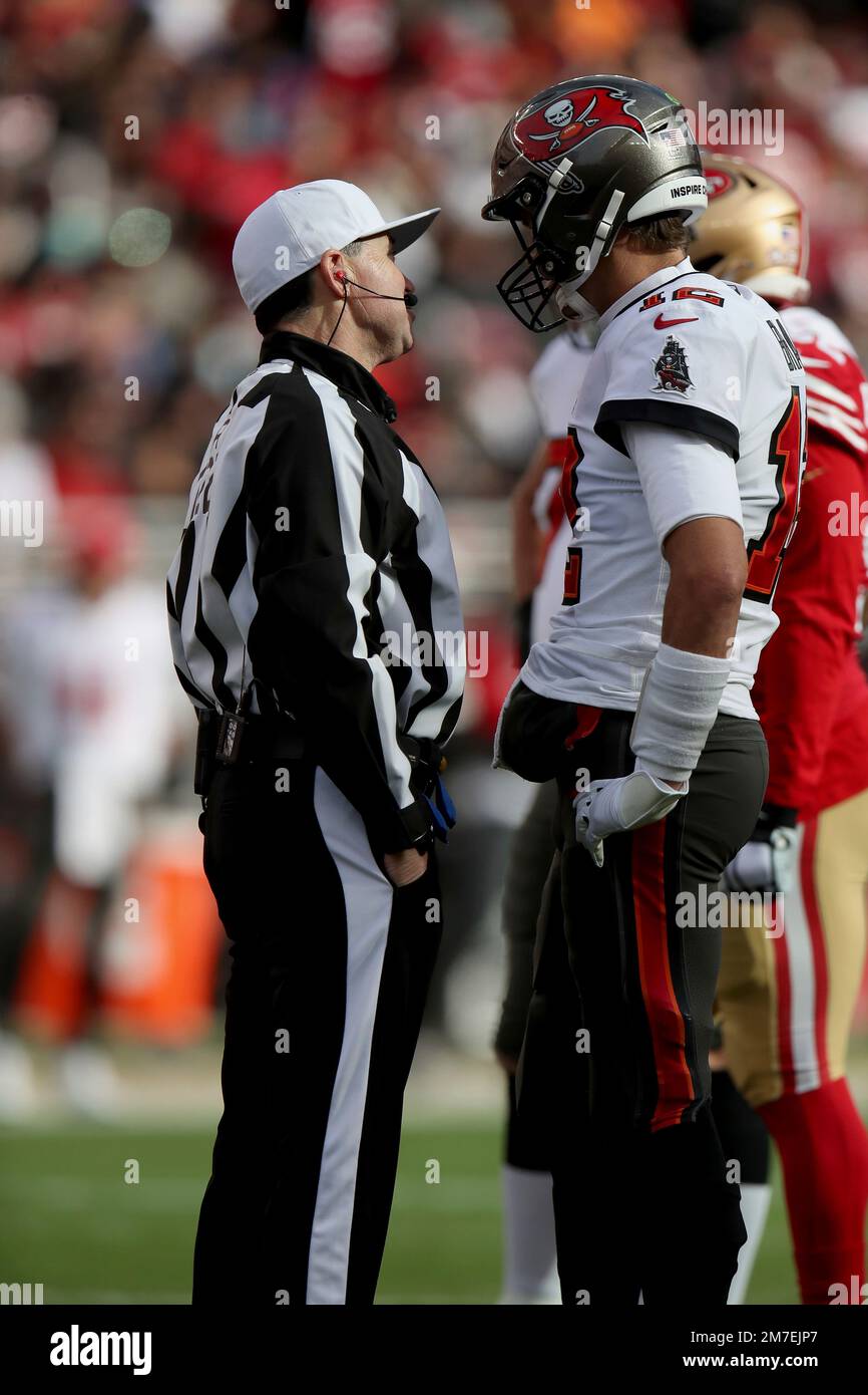 Tampa Bay Buccaneers quarterback Tom Brady (12) and referee Brad Allen ...