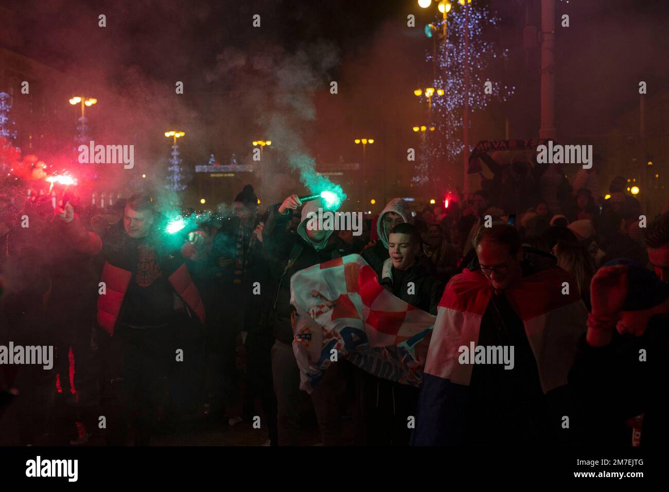 Croatian fans light flares after their team lost to Argentina at the ...
