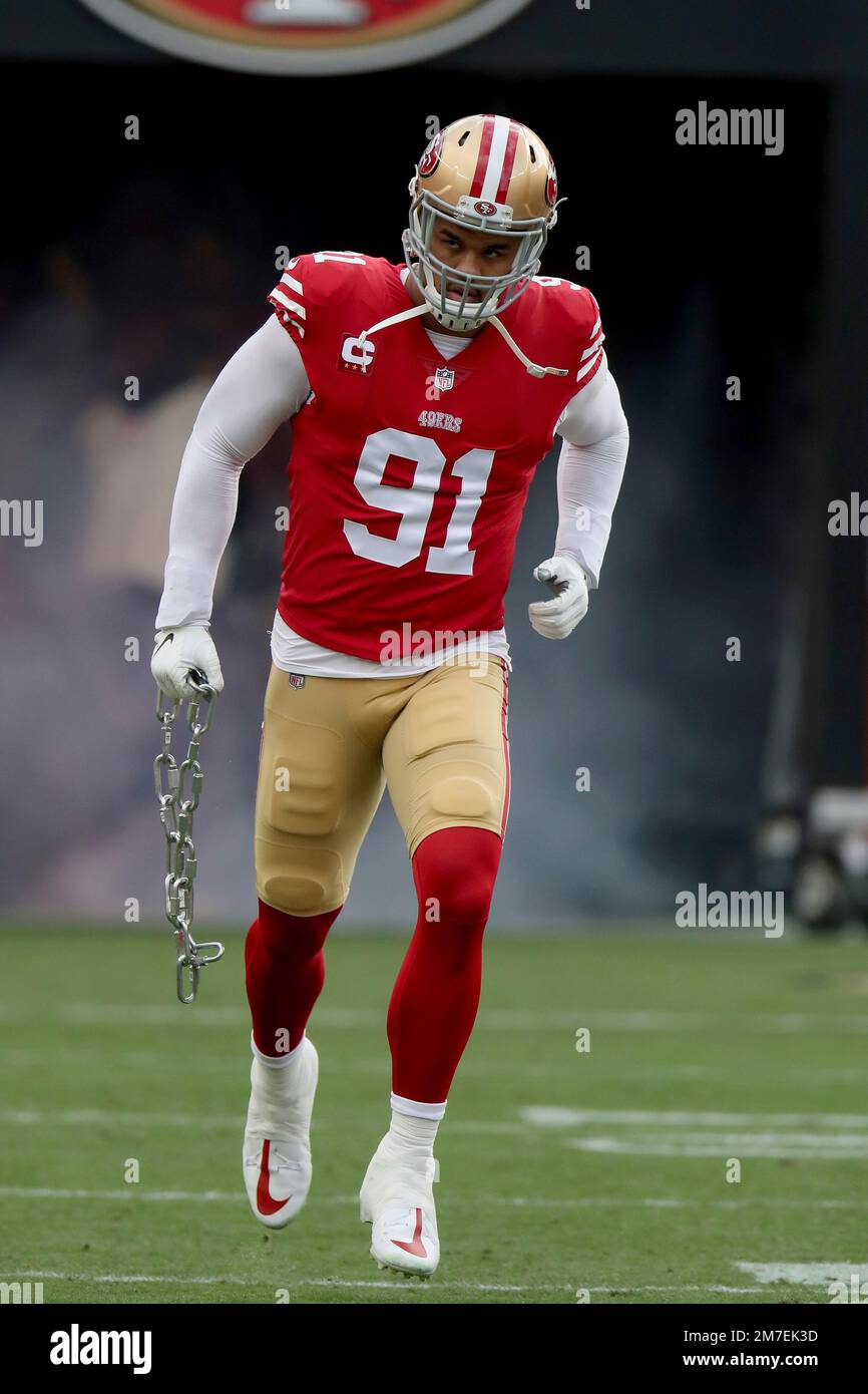 San Francisco 49ers defensive end Arik Armstead (91) runs onto the ...