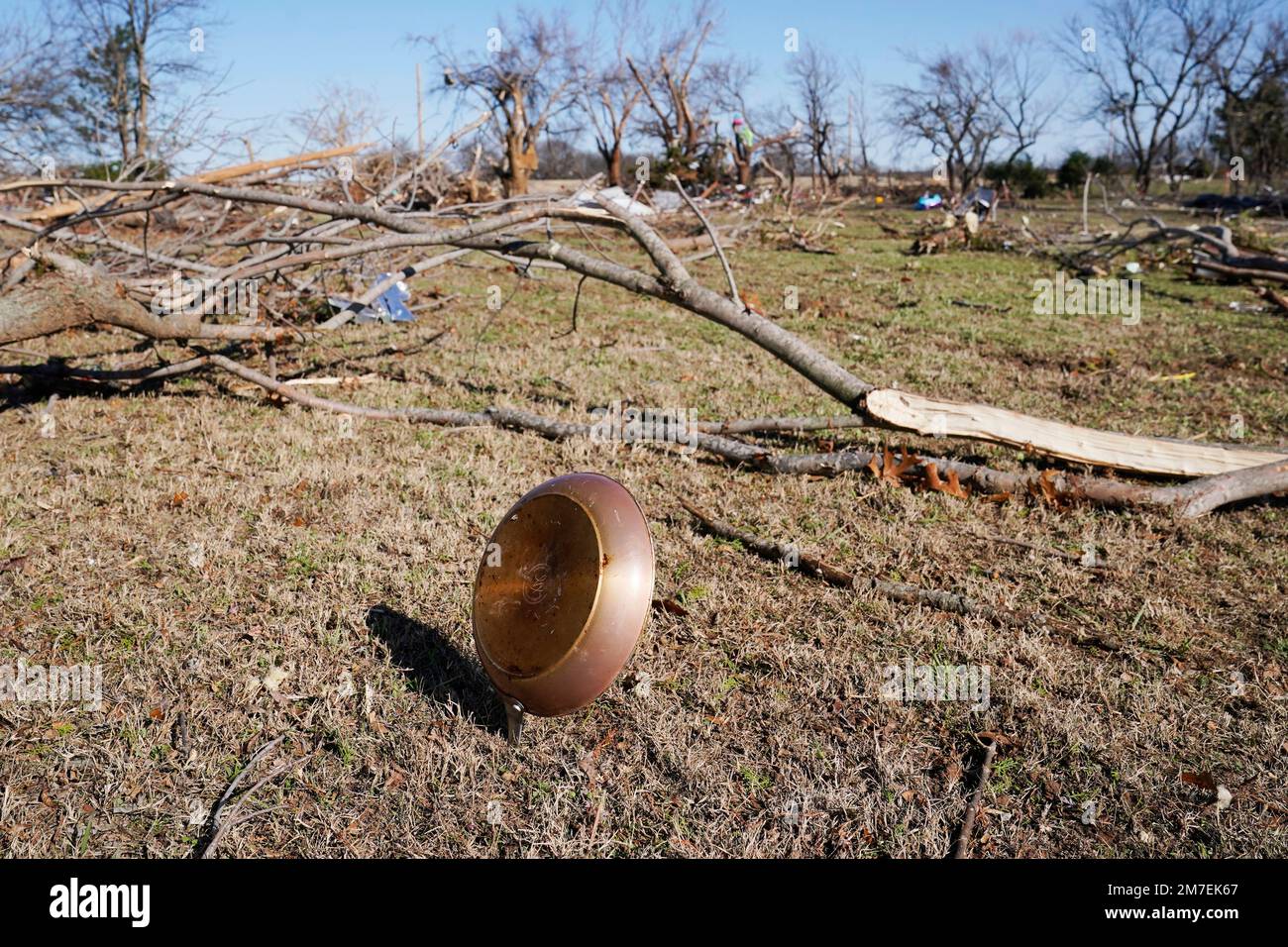 A frying pan is stuck in the ground Tuesday, Dec. 13, 2022, after a ...
