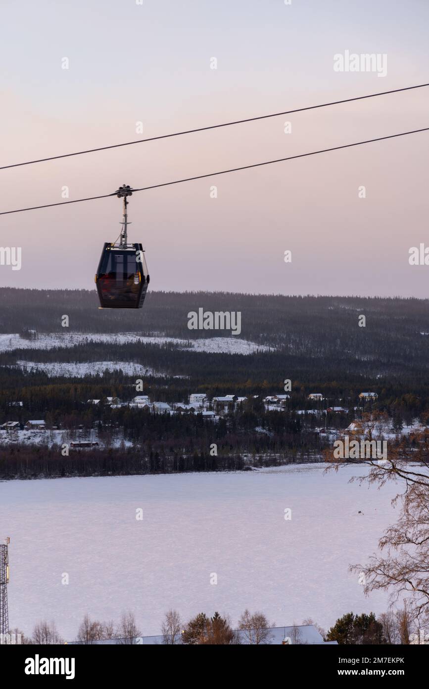 Beautiful ski slope in Funasdalen, Sweden with ski lift, gondola going ...