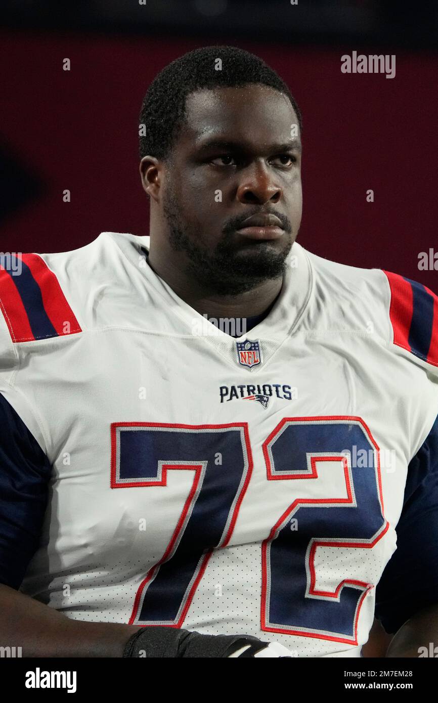 New England Patriots offensive tackle Yodny Cajuste (72) warms up ...
