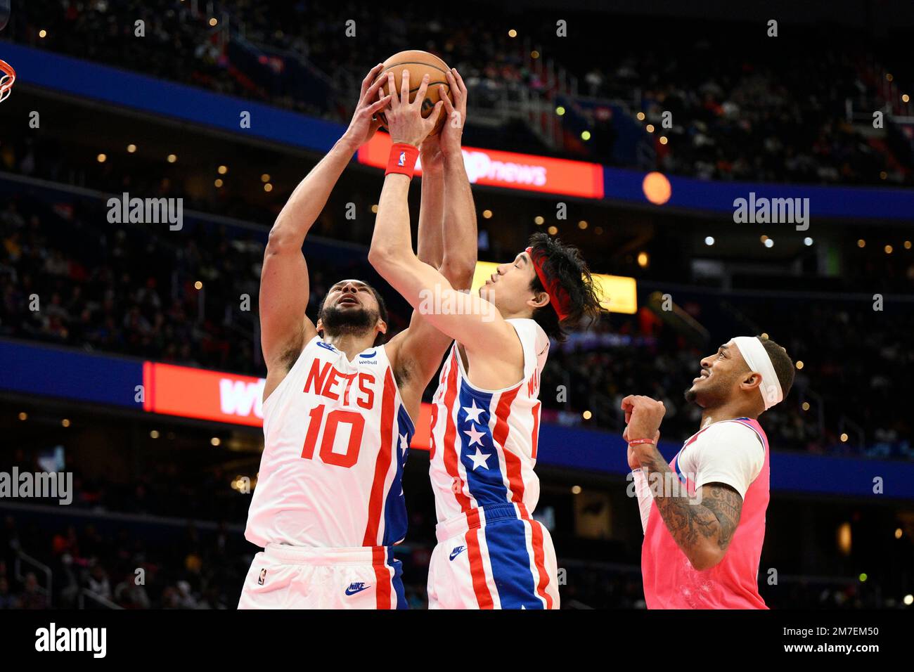 Brooklyn Nets guard Ben Simmons (10) and forward Yuta Watanabe (18) in ...