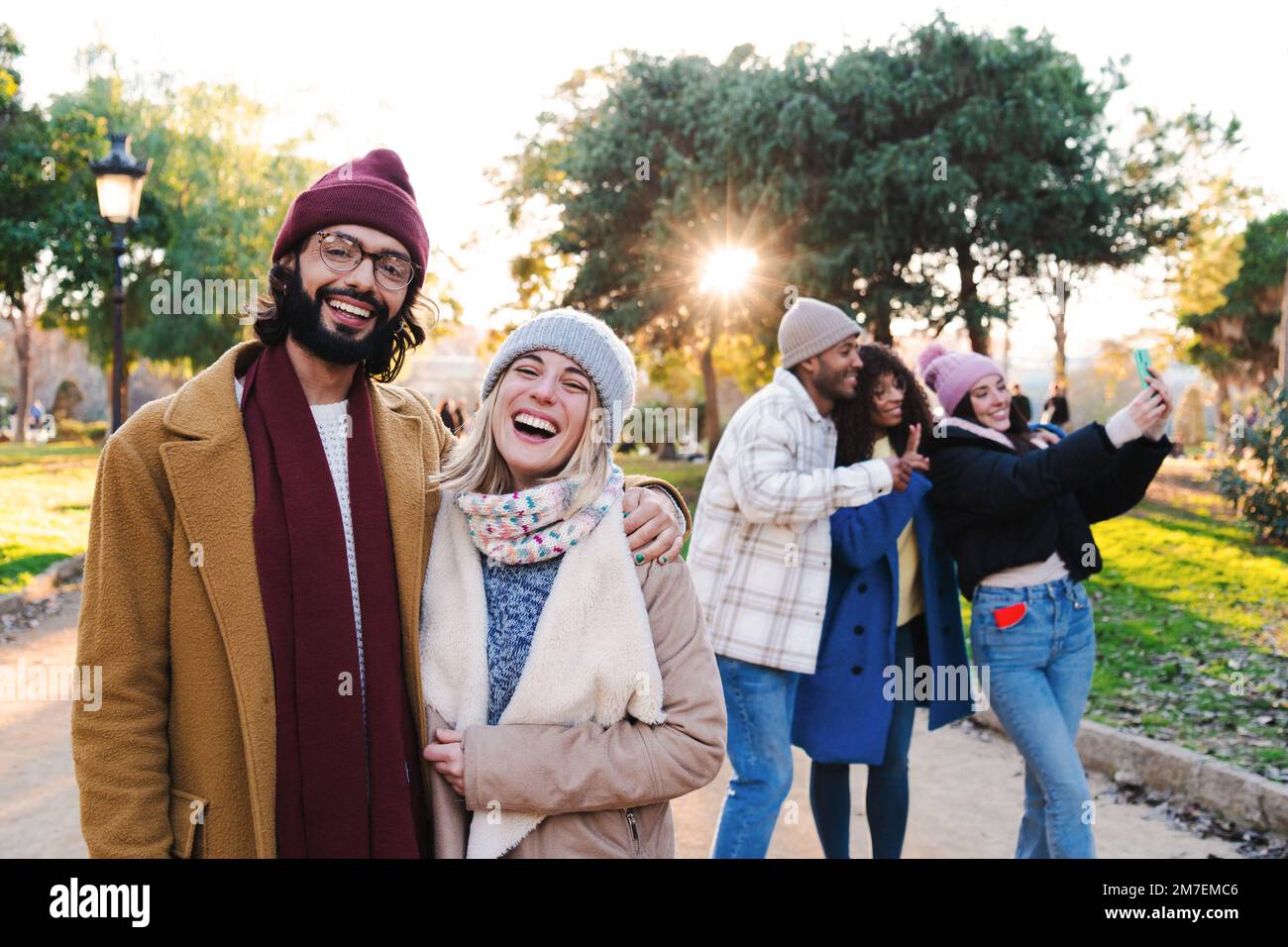 Portrait group friends wearing coats hi-res stock photography and ...