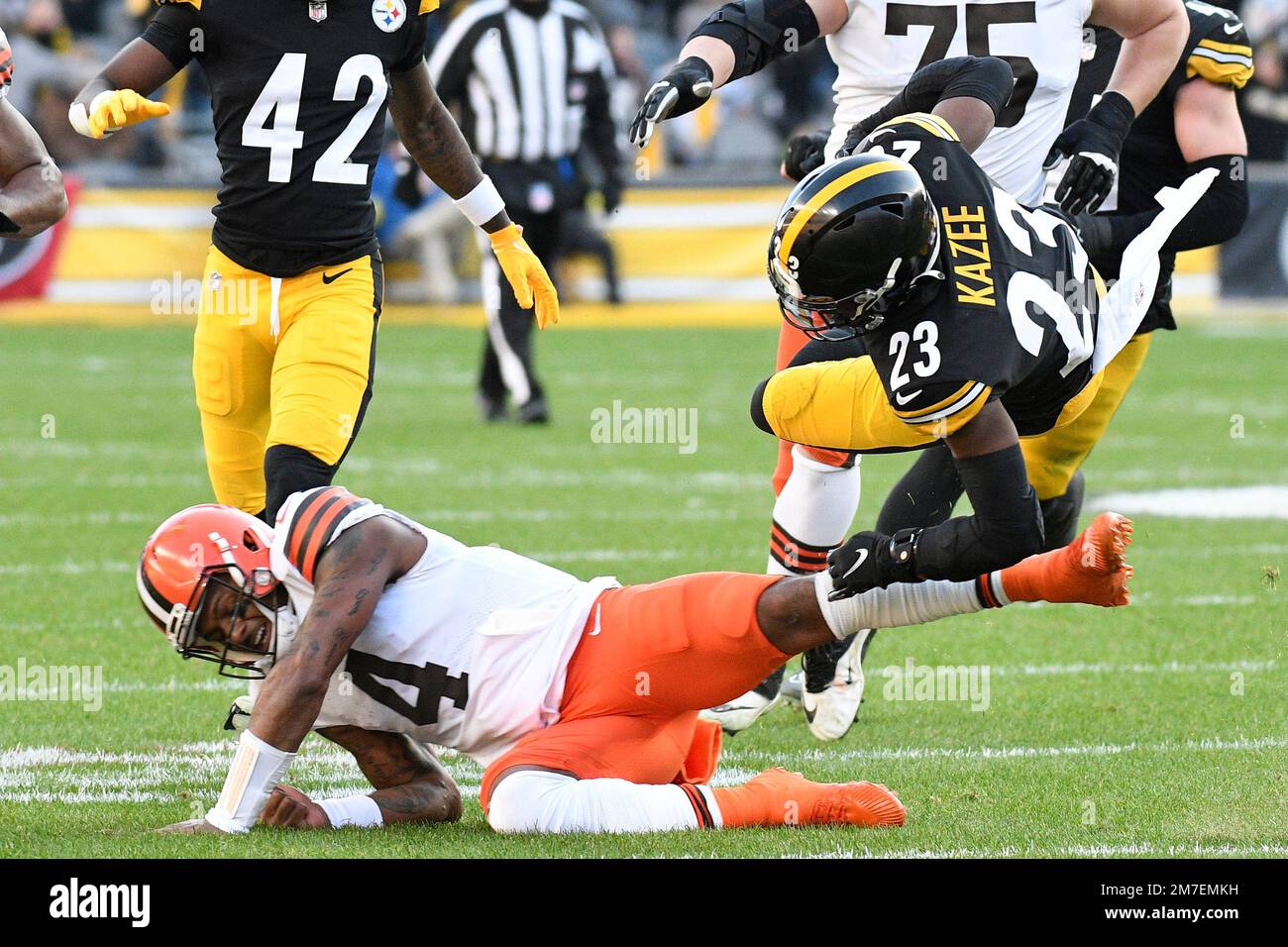 Pittsburgh Steelers safety Damontae Kazee (23) is upended by Cleveland ...