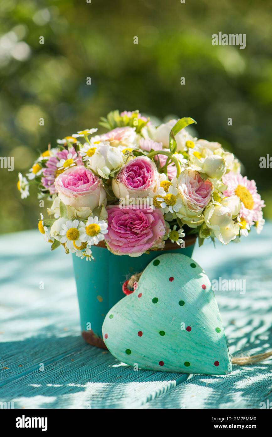 Little flower bouquet with pink roses Stock Photo - Alamy