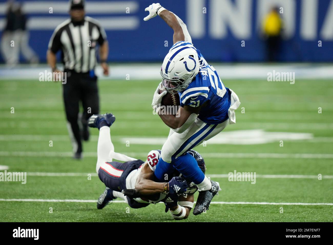 Indianapolis Colts running back Zack Moss (21) is tackled by Houston ...