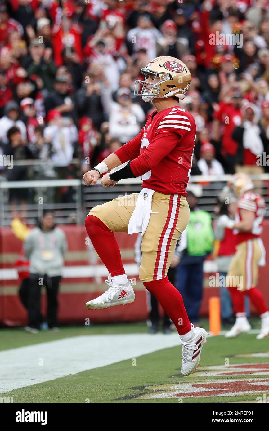 San Francisco 49ers quarterback Brock Purdy reacts after scoring during ...