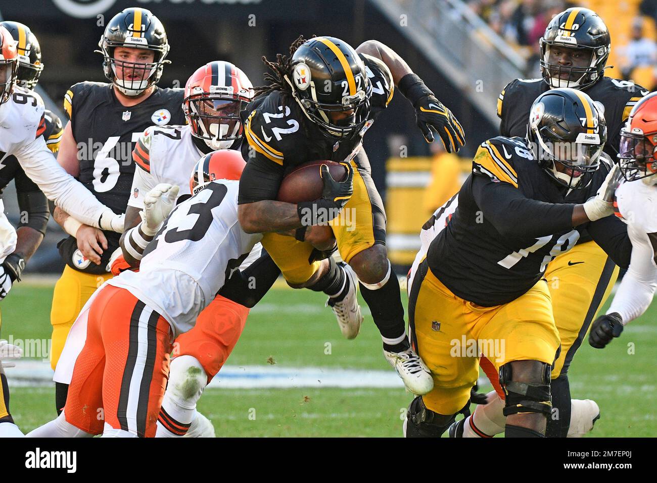 Pittsburgh Steelers running back Najee Harris (22) is upended by ...