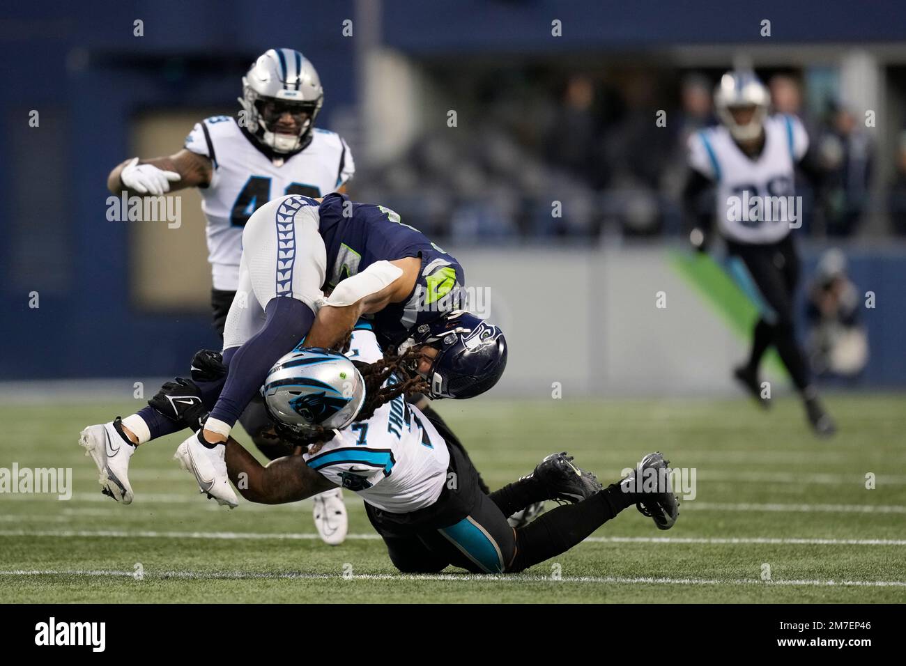 Carolina Panthers linebacker Shaq Thompson (7) tackles Seattle Seahawks ...