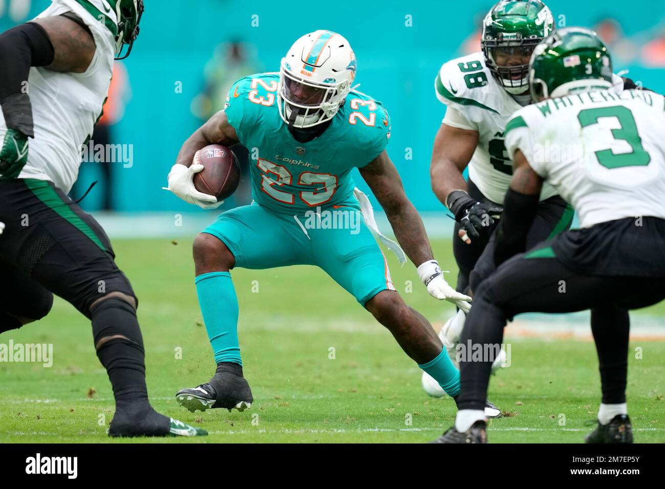 Miami Dolphins running back Jeff Wilson Jr. (23) runs a play during the first half of an NFL ...