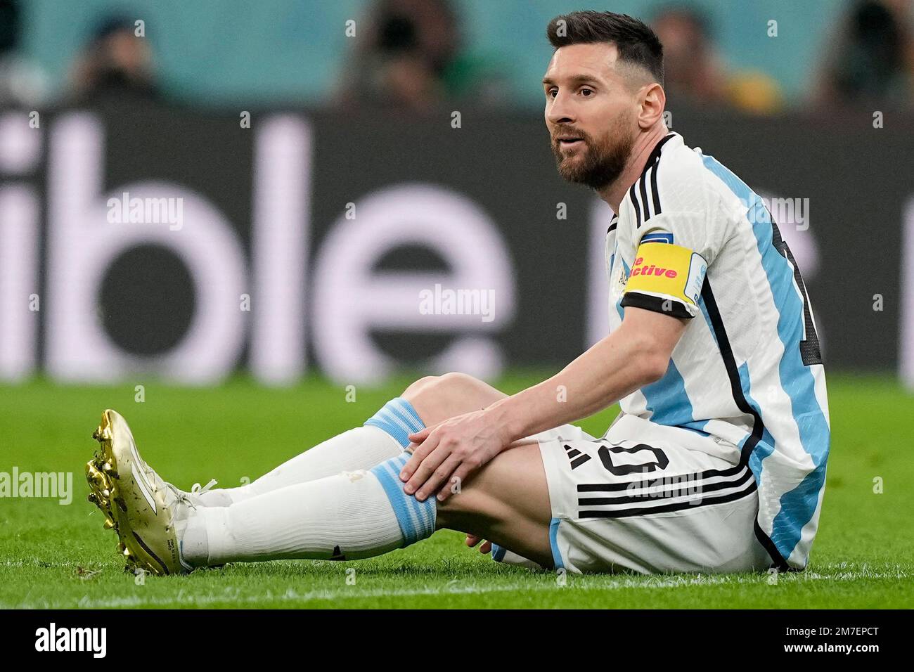 Argentina's Lionel Messi sits on the ground during the World Cup ...