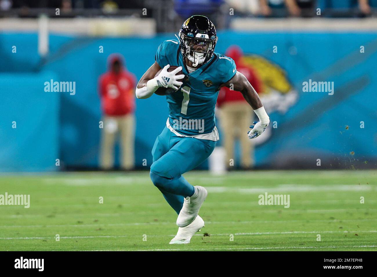 Jacksonville Jaguars running back Travis Etienne Jr. (1) runs the ball ...