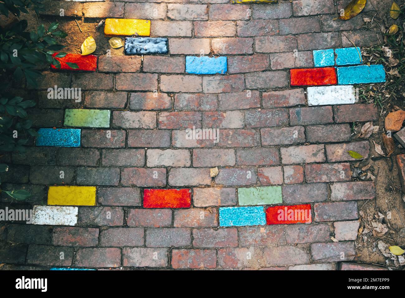 Top view of old beautiful multicolor bricks paving stones footpath ...