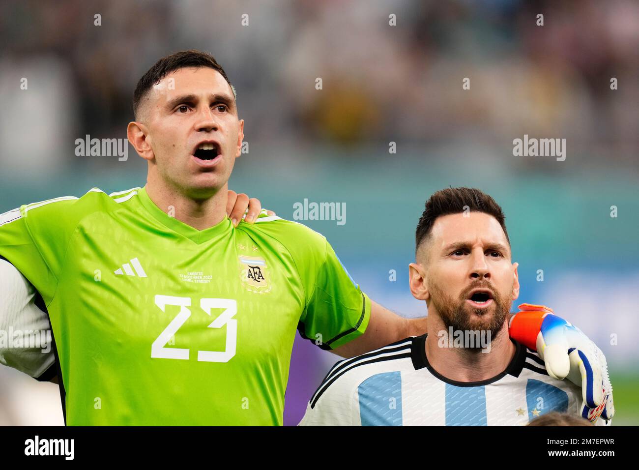 Argentina's goalkeeper Emiliano Martinez and Lionel Messi sing national ...